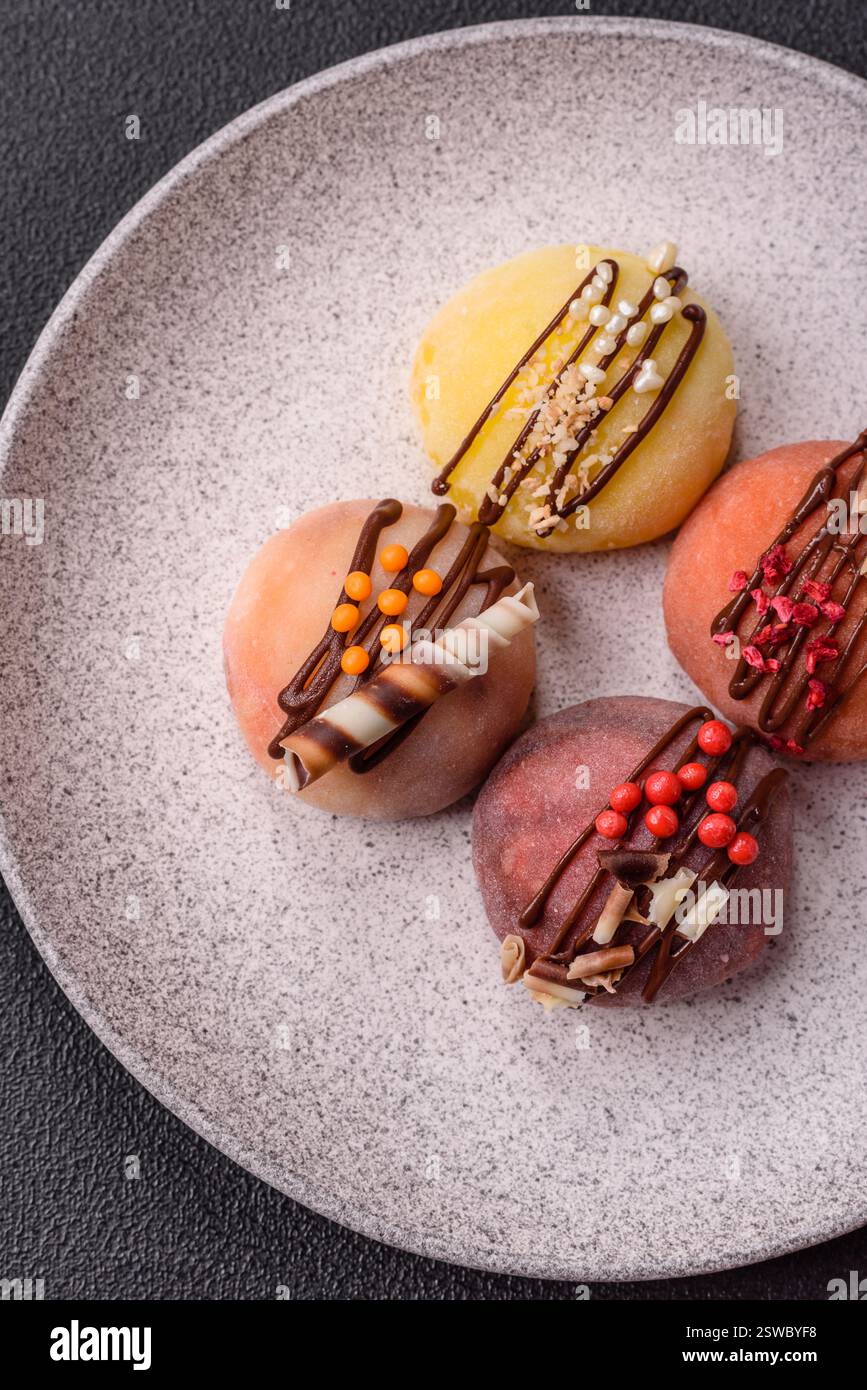 Delicious colorful asian mochi sweets with rice dough shell and fruit ...