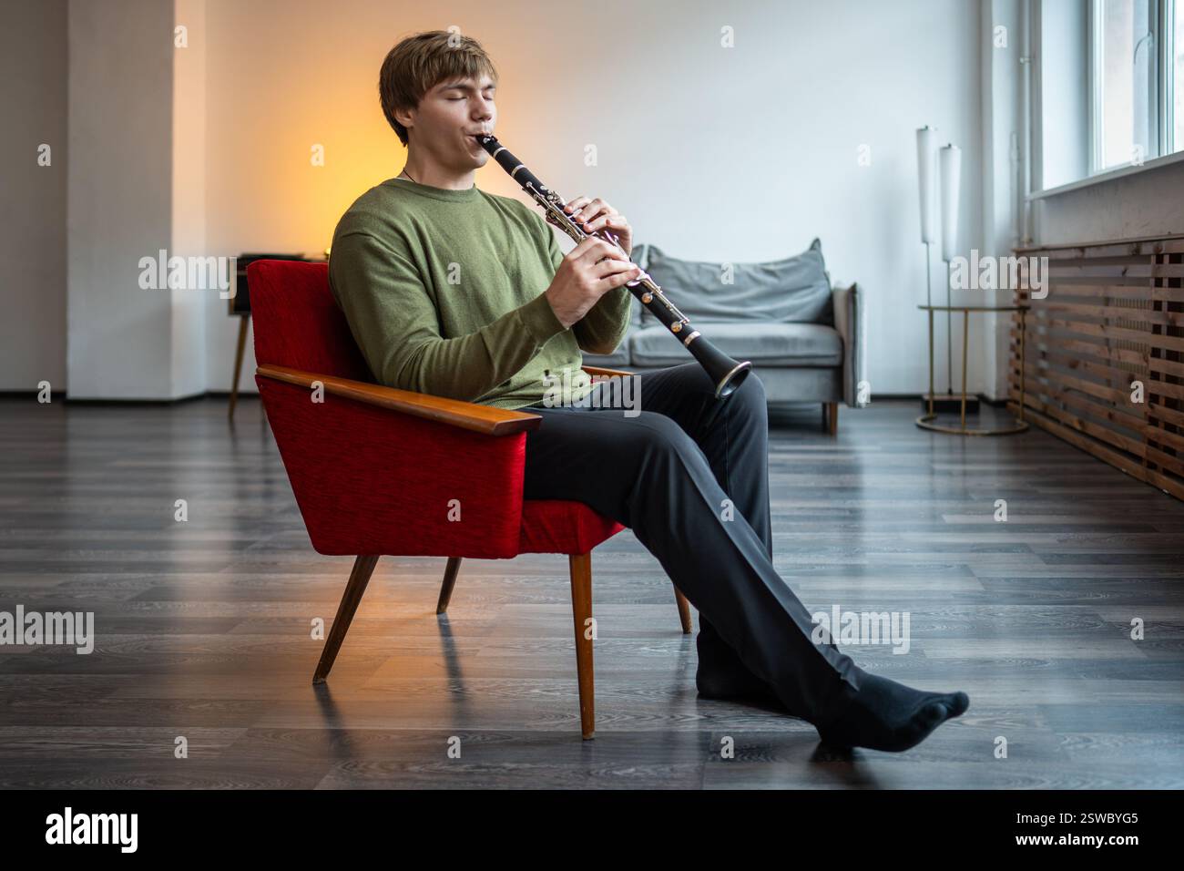 Clarinet player. Man clarinetist playing flute woodwind music ...