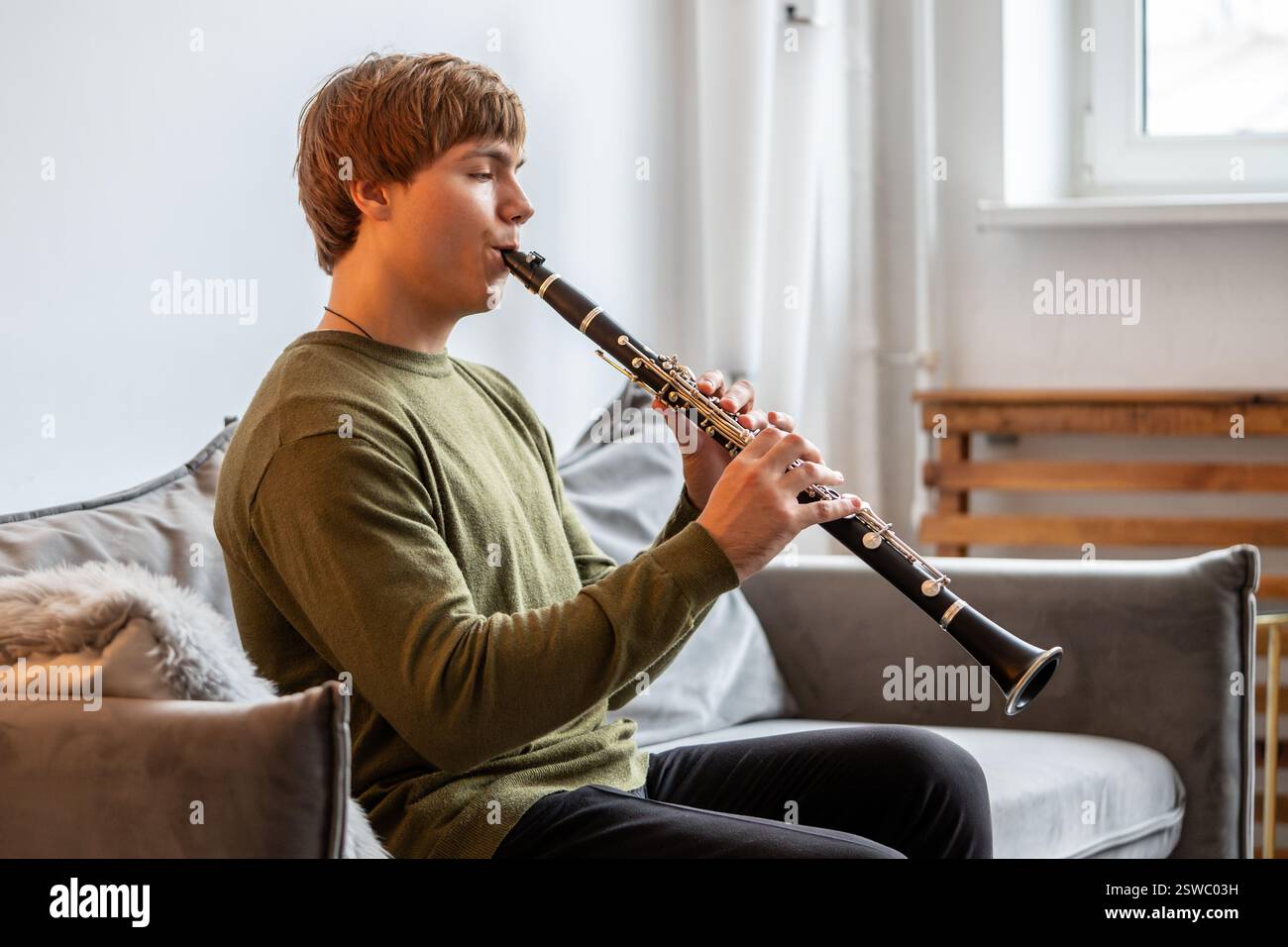 Clarinet player. Man clarinetist playing flute woodwind music ...