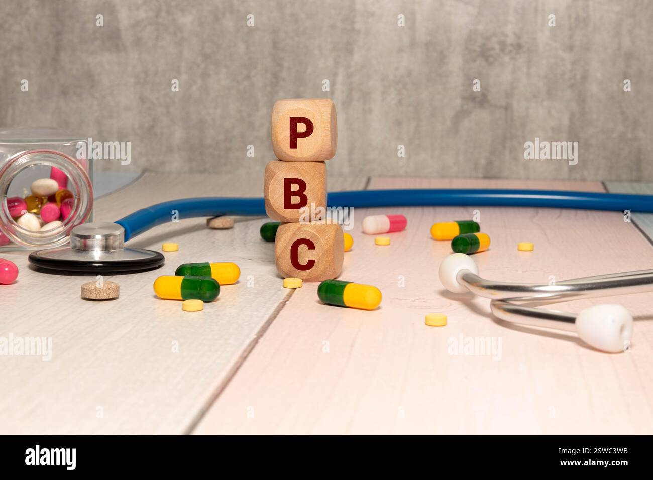 PBC Primary biliary cholangitis - word from wooden blocks with letters ...