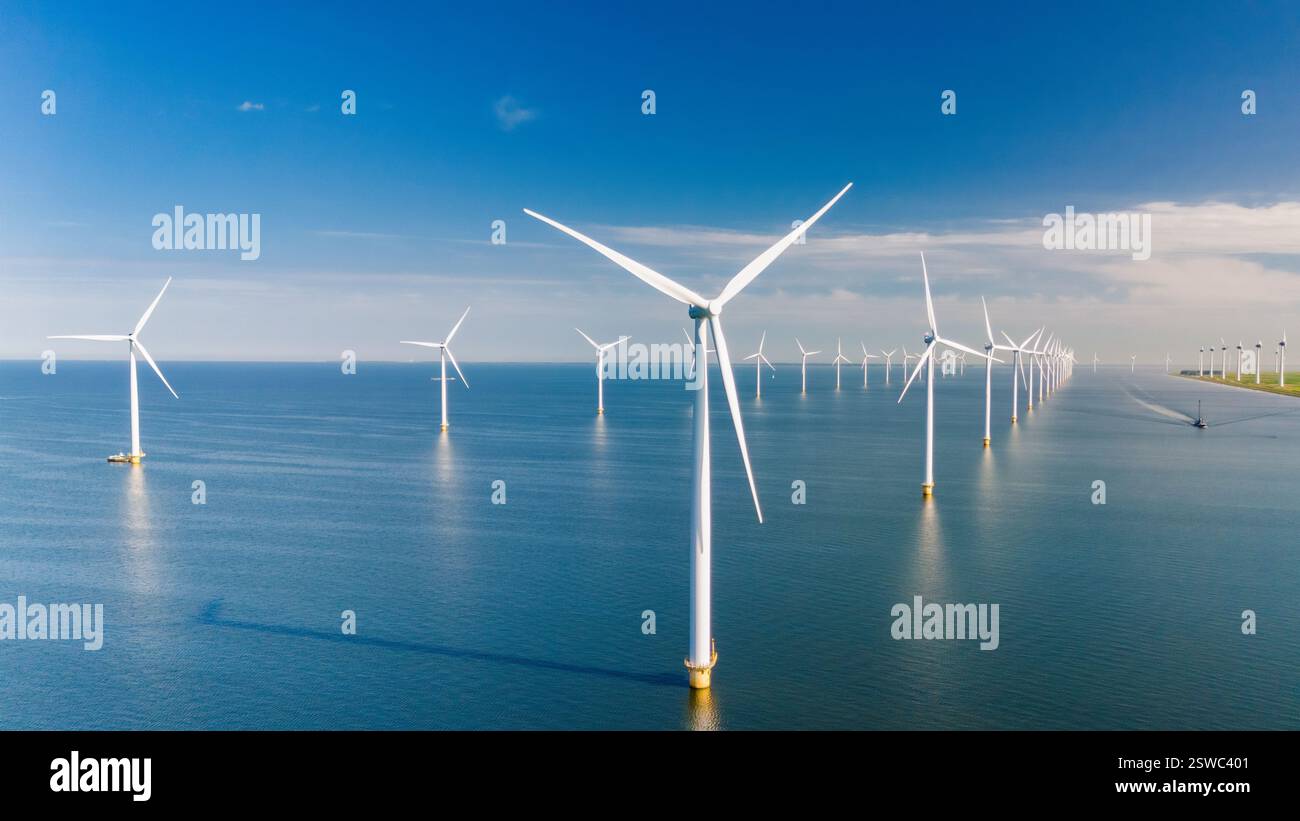 offshore windmill farm in ocean, green energy transition, zero ...