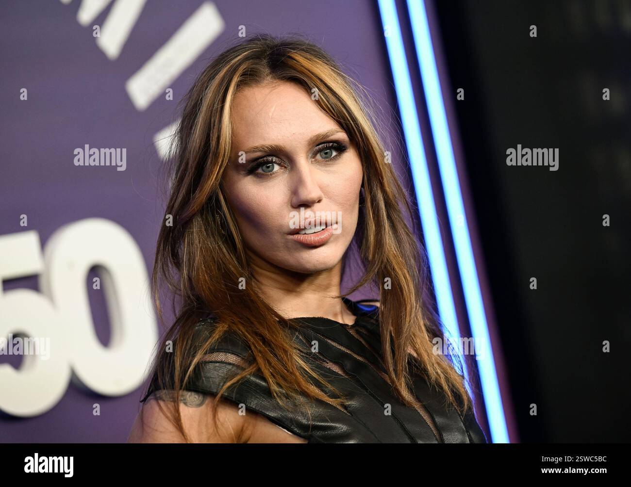 Miley Cyrus attends the SNL50: The Homecoming Concert at Radio City ...