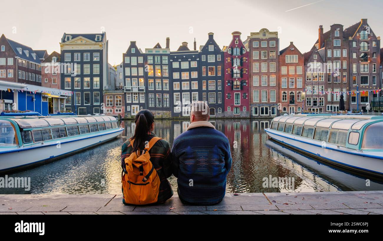 Surrounded by iconic colorful buildings peaceful boats the gentle fall ...