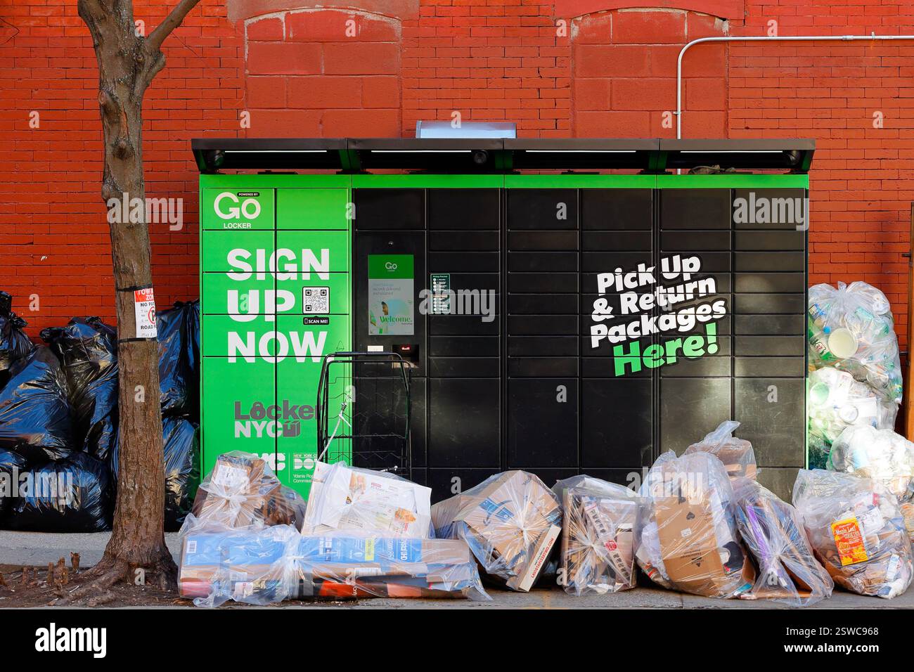 A LockerNYC package delivery smart locker surrounded by residential ...