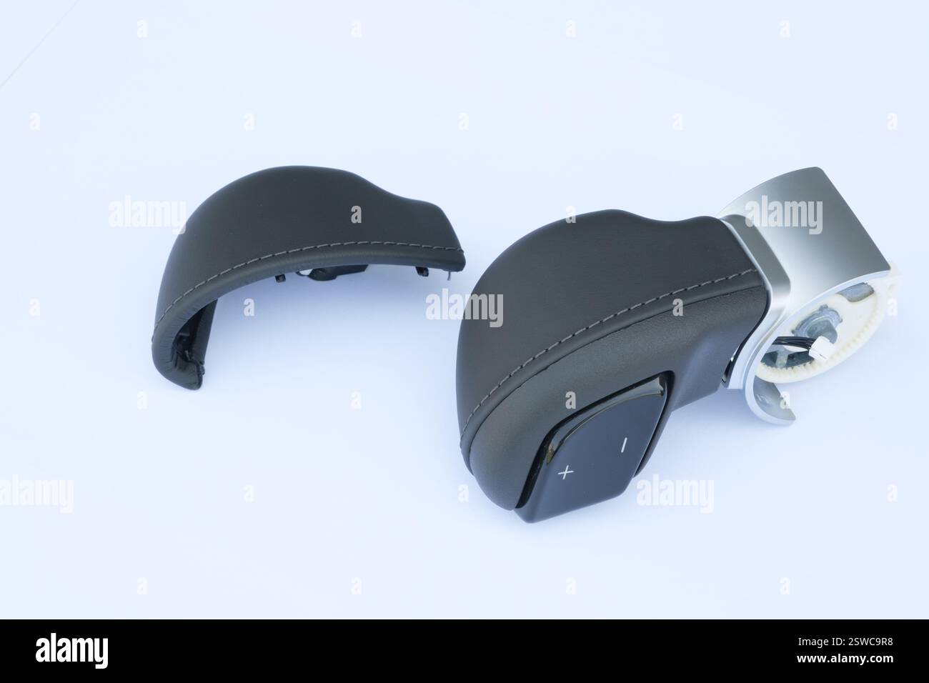 Automotive Gear Shifter with Stitching Detail on white backdrop Close ...