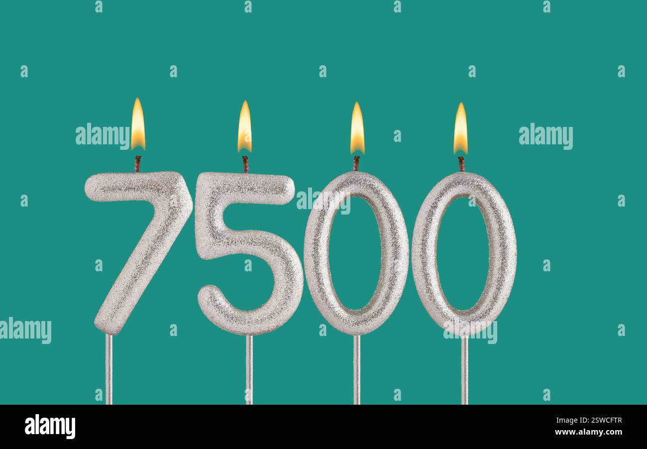 Number of followers or likes - Candle number 7500 Stock Photo - Alamy