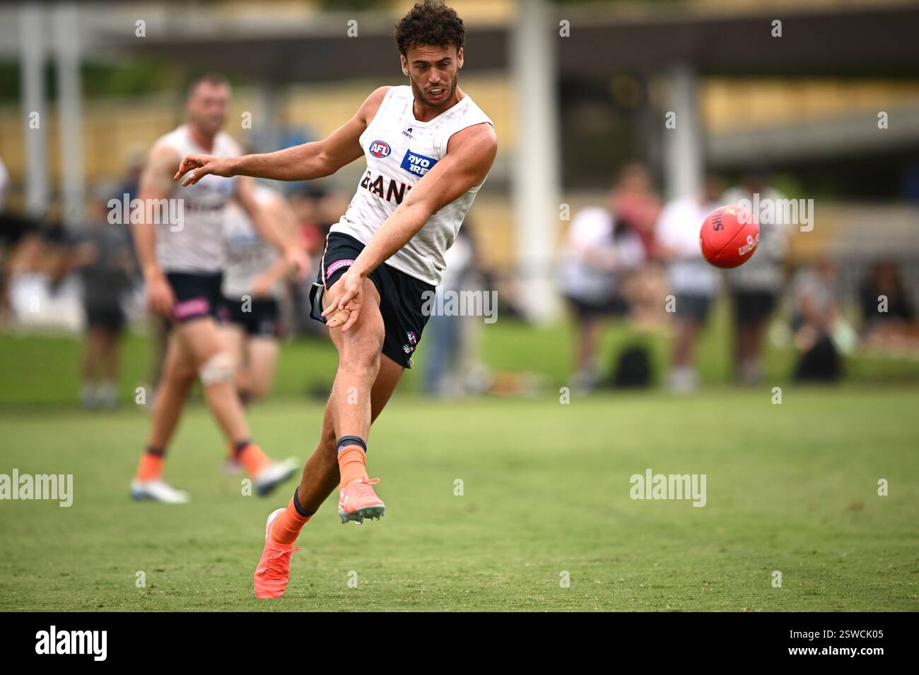 Sydney, Australia. 21st Feb, 2025. Jake Riccardi of the Giants kicks ...