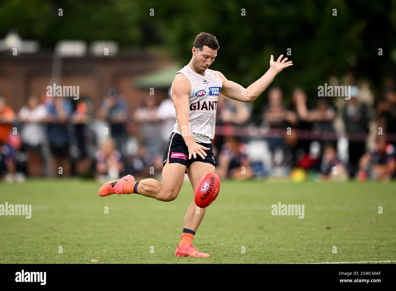 Sydney, Australia. 21st Feb, 2025. Toby Greene of the Giants kicks ...