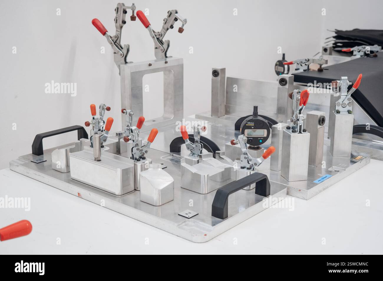 Metal manufacturing jig used in industrial production with gauges and ...