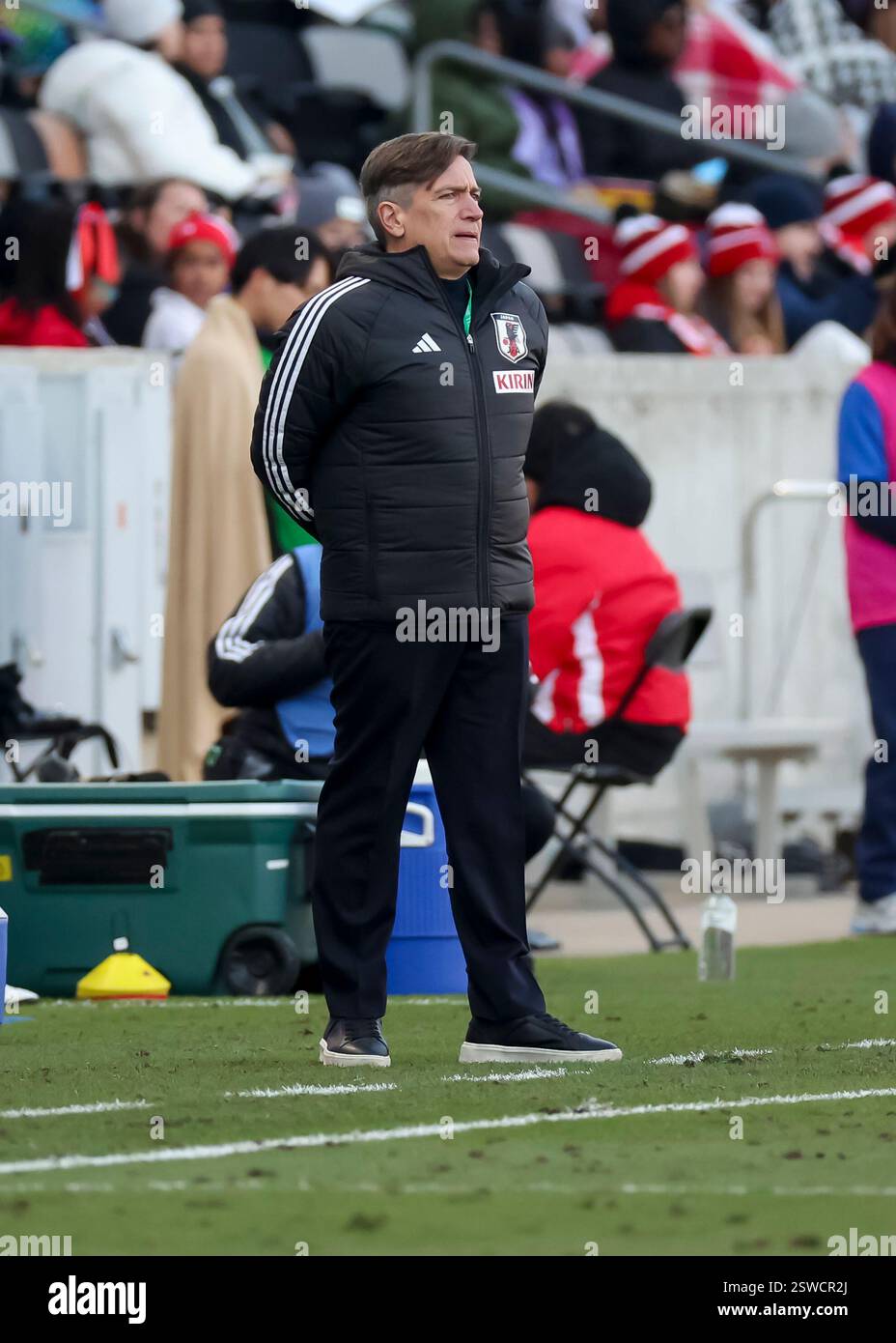 HOUSTON, TX - FEBRUARY 20: Japan head coach Nils Nielsen watches a play ...