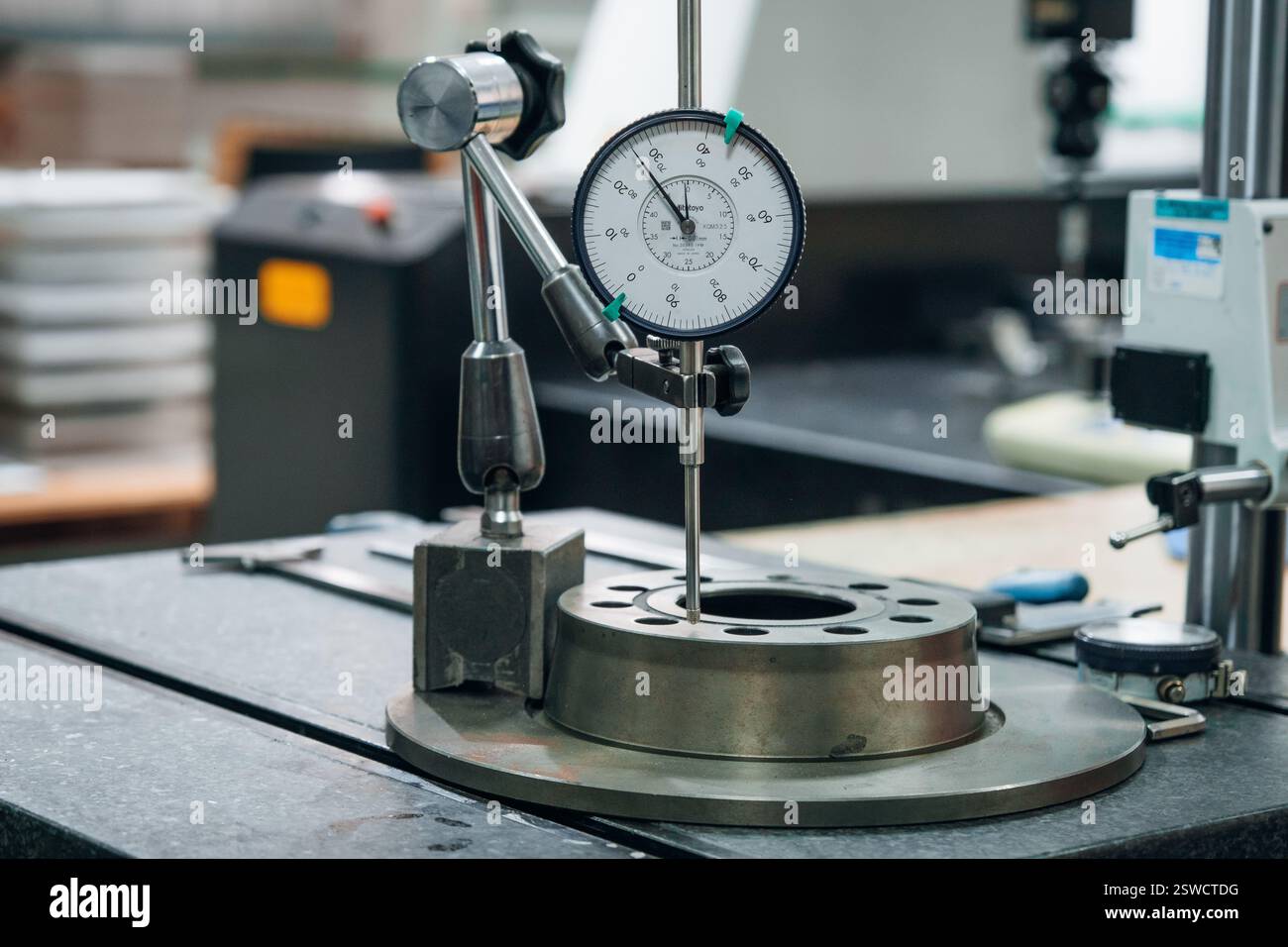 Precision measurement: dial indicator assessing the uniformity of a ...