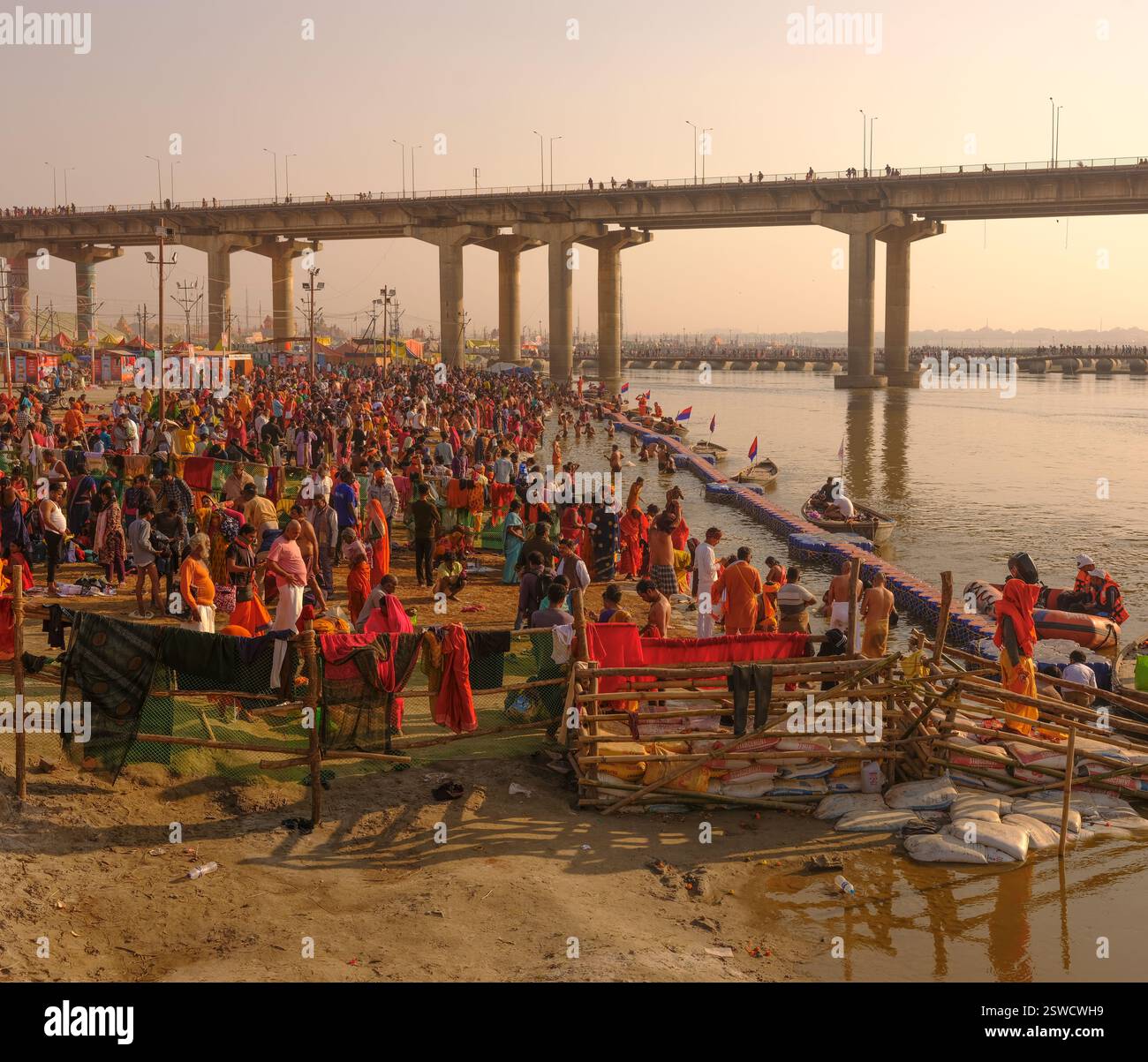 Pilgrims gather in vibrant crowds at Triveni Sangam at the Maha Kumbh ...