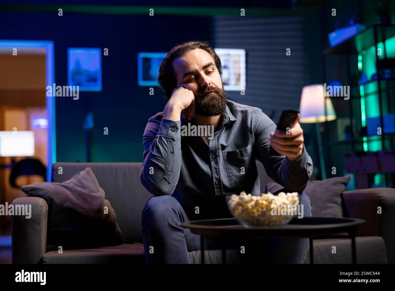 Cord cutter bored at home using TV to watch films on streaming services ...