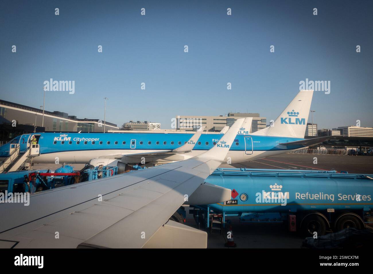 SCHIPHOL, NETHERLANDS - AUGUST 15, 2024: Multiple KLM aircraft parked ...