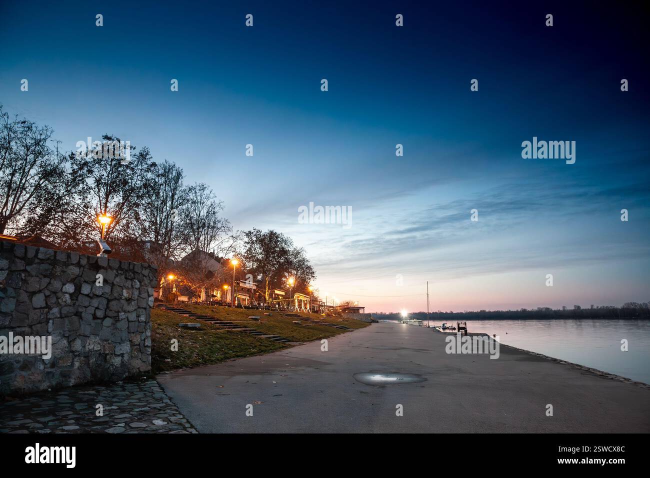 Evening panorama of the famous Zemunski Kej promenade along the Danube ...
