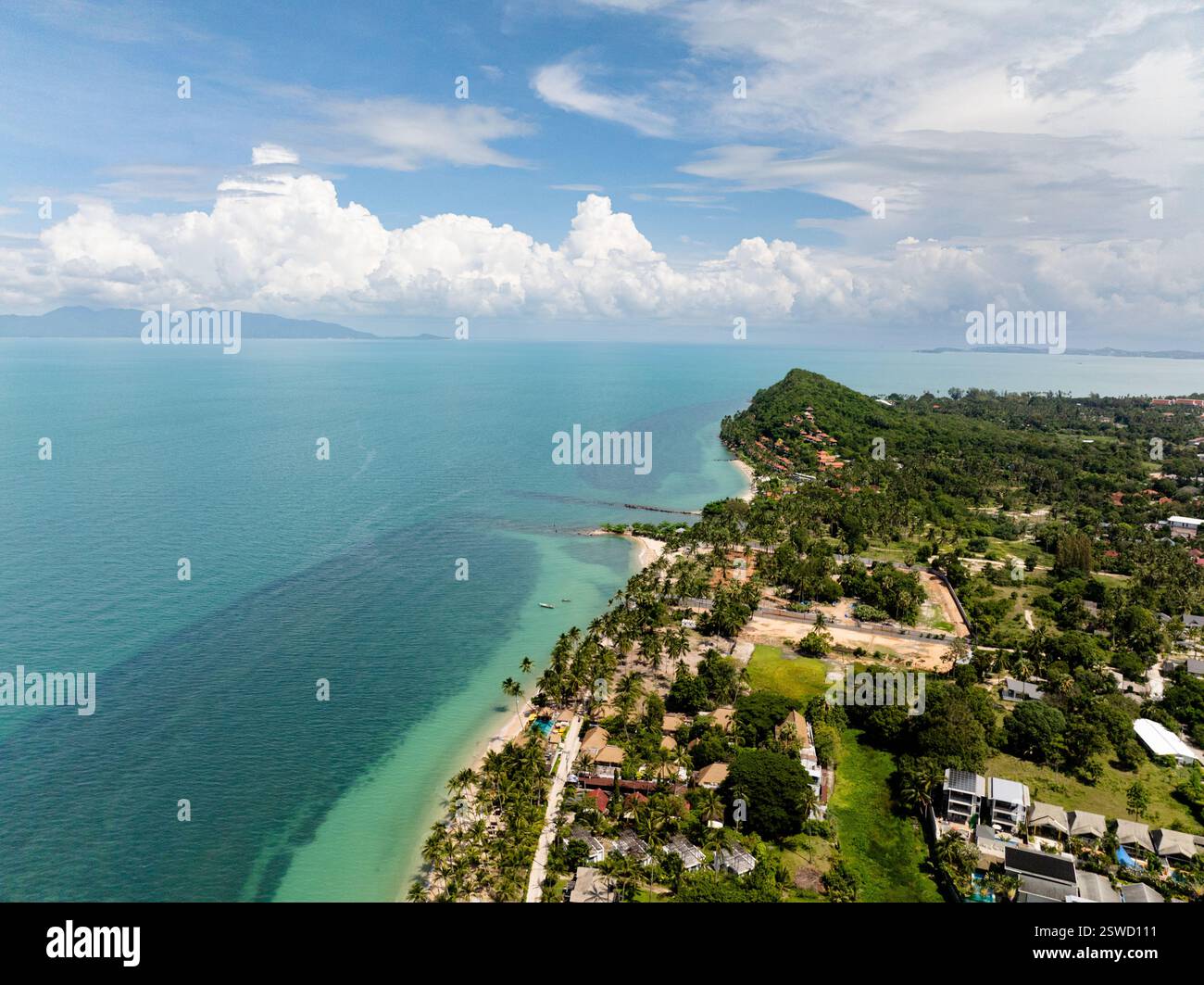 Island landscape featuring tropical vegetation, sandy beaches, and calm ...