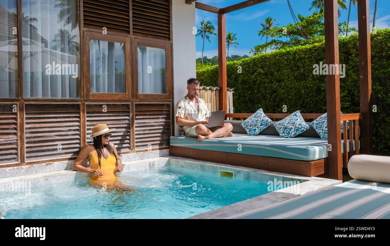 Working by the pool in Thailand as a successful freelancer enjoying the ...