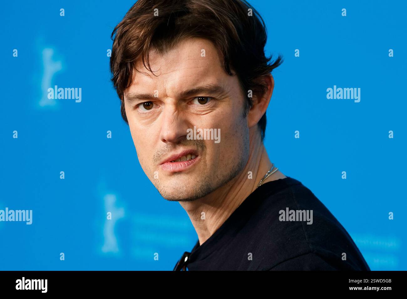 Sam Riley poses at the photocall of 'Islands' during the 75th Berlinale ...