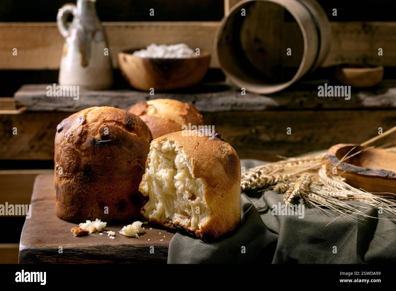 Homemade traditional italian brioche wheat bread whole and half Stock ...
