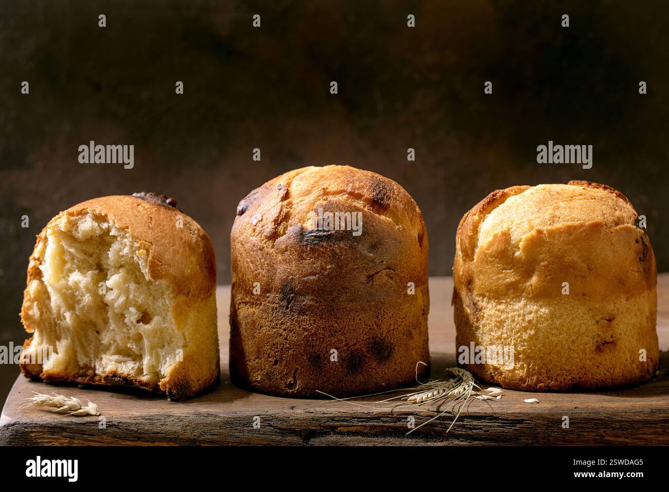 Homemade traditional italian brioche wheat bread whole and half Stock ...