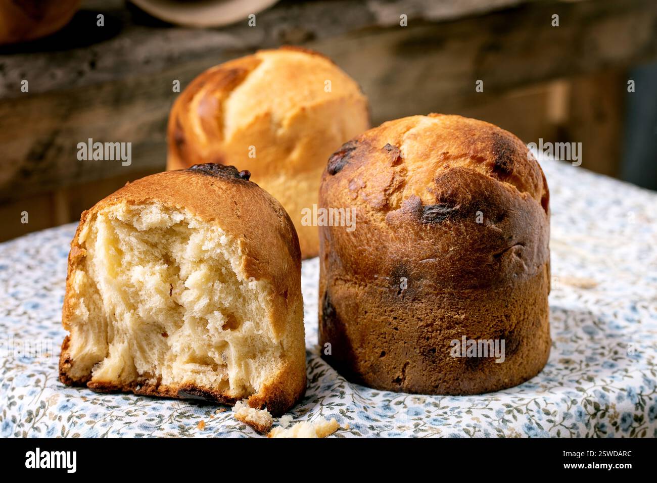 Homemade traditional italian brioche wheat bread whole and half Stock ...