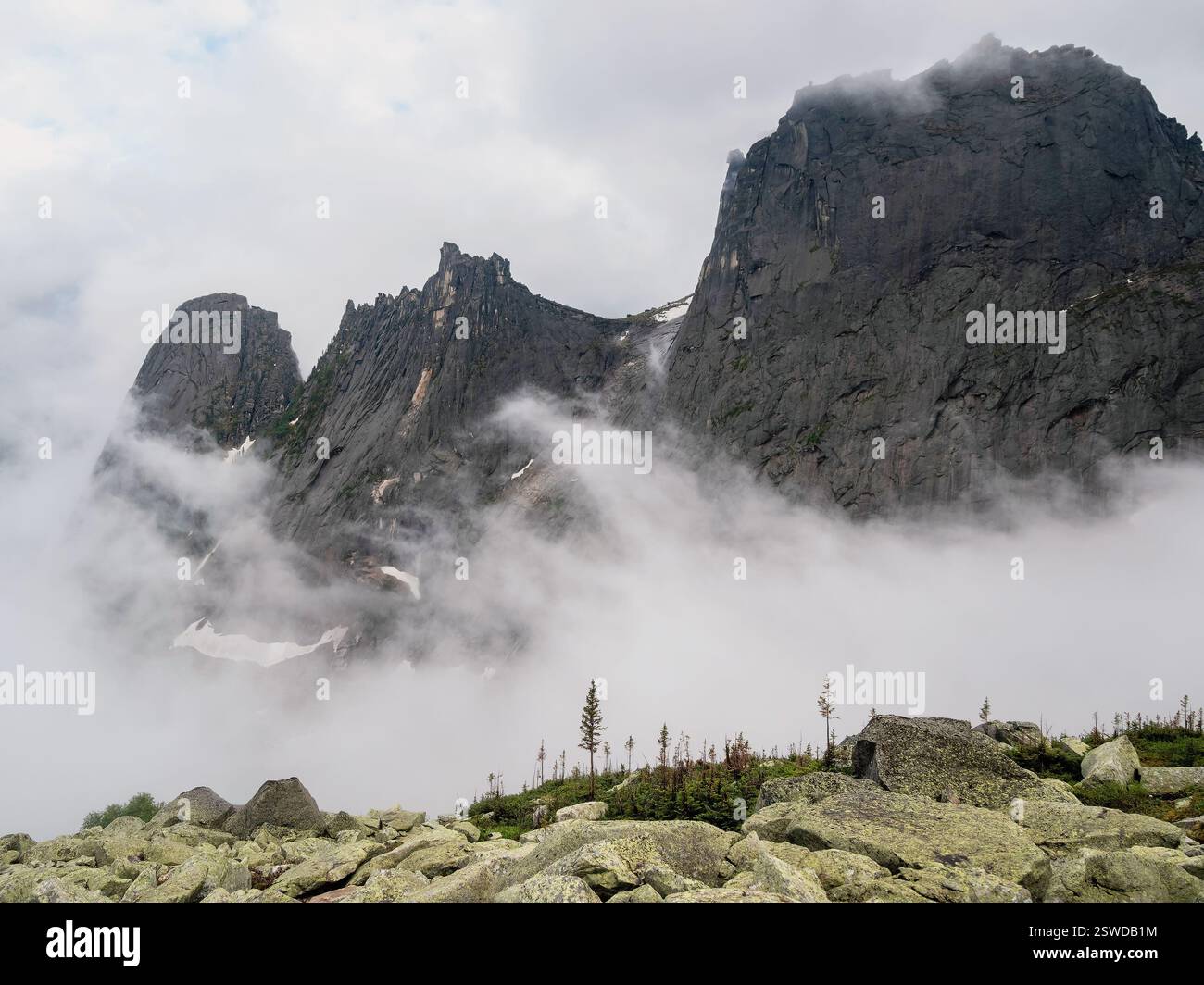 Mystical mountains. Rapid change in the weather, a thunderstorm front ...