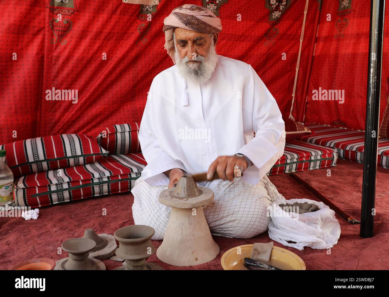Dibba Al Baya. 21st Feb, 2025. An Omani man in traditional attire ...