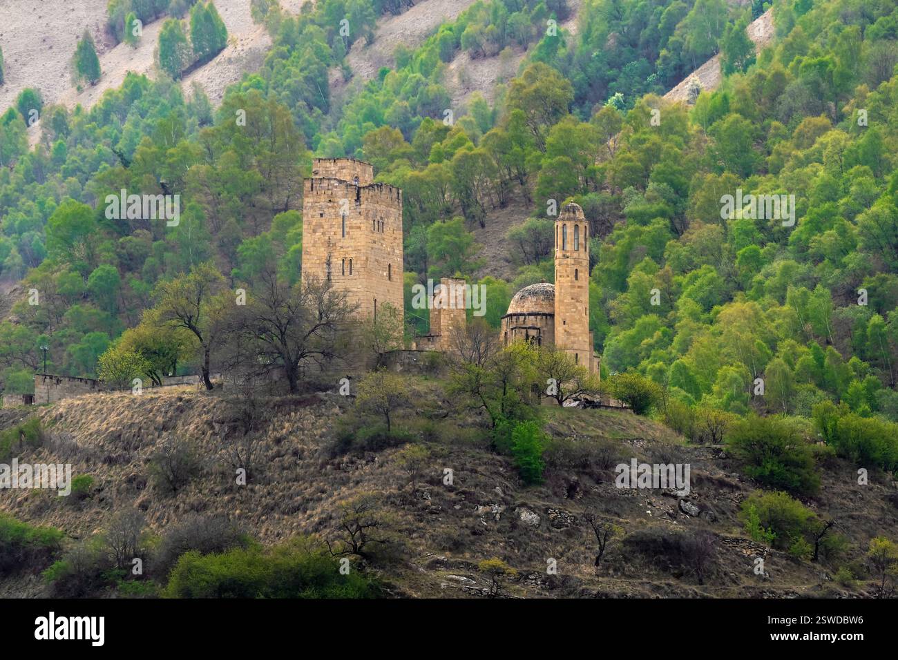 Stone ancient monastery on the green mountain. Memorial complex Vatan ...