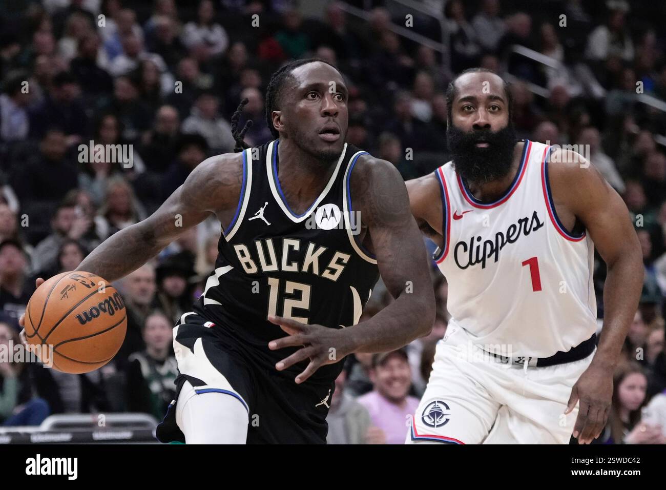 Milwaukee Bucks' Taurean Prince gets past LA Clippers' James Harden ...