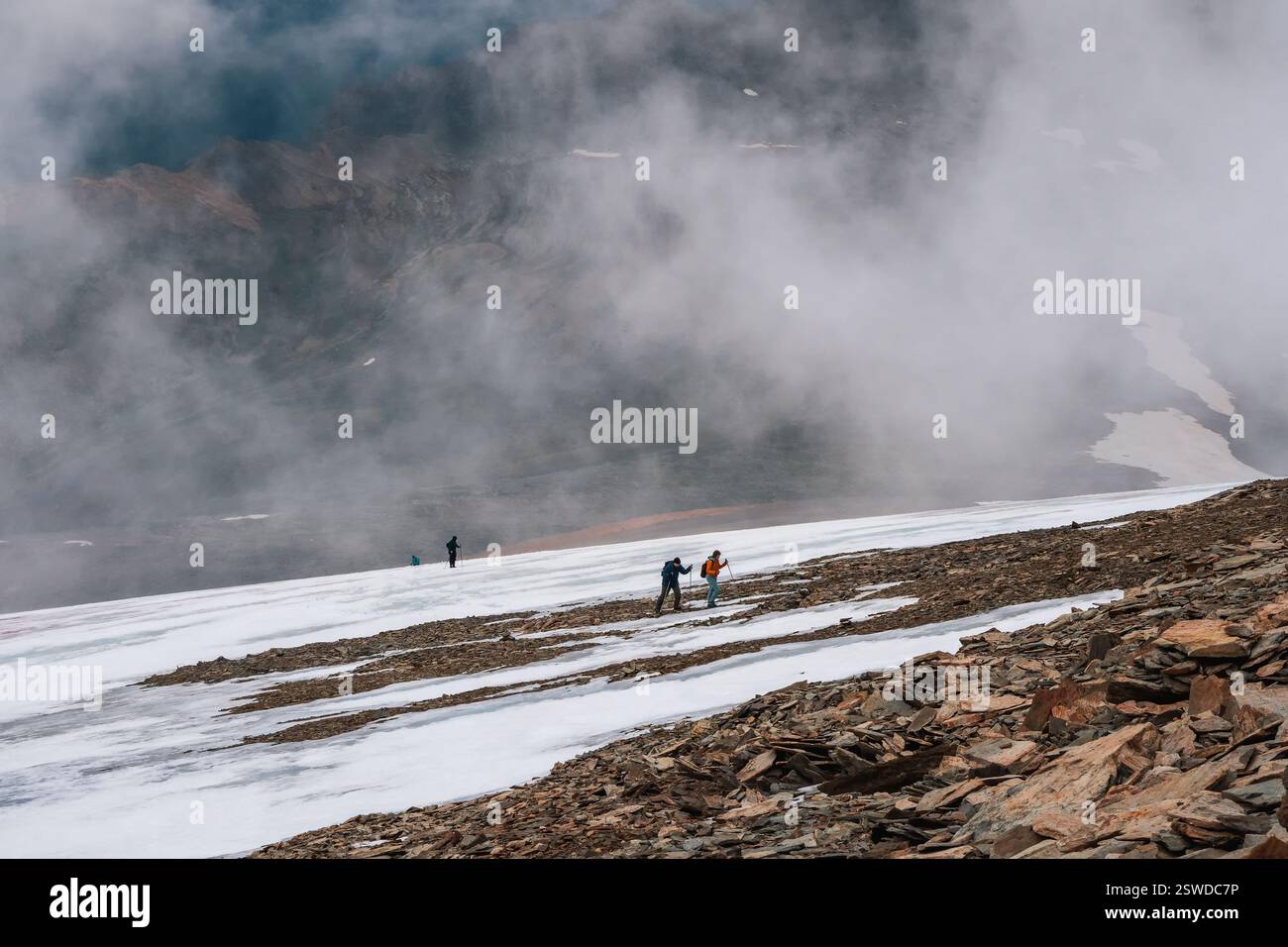 Soft focus. Difficult extreme climb to the top of the mountain. Travel ...