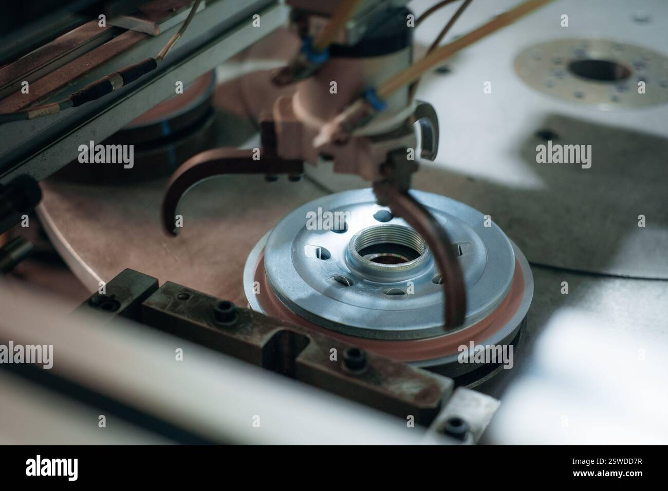 Automated machine precision assembling component parts ensuring ...