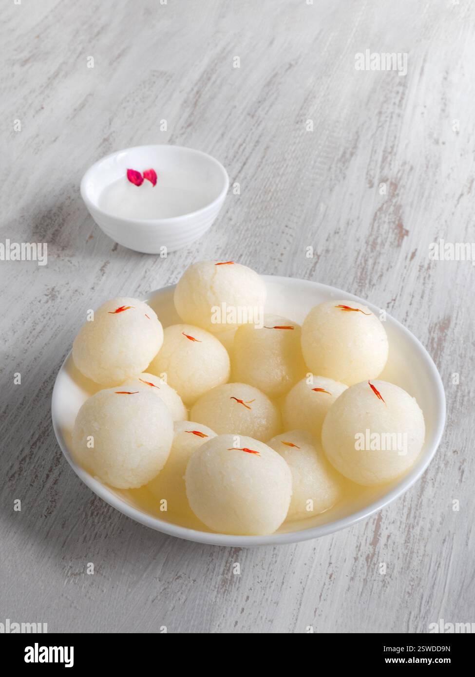 Sponge Rasgulla sweets, famous indian sweet food Stock Photo - Alamy