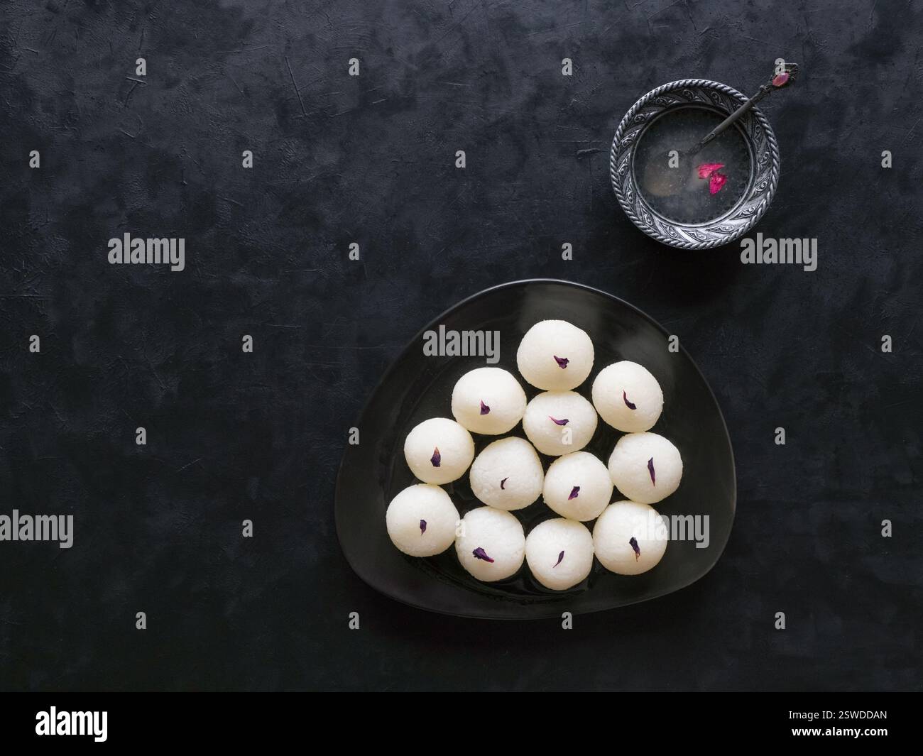 Sponge Rasgulla sweets, famous indian sweet food. Top view Stock Photo ...