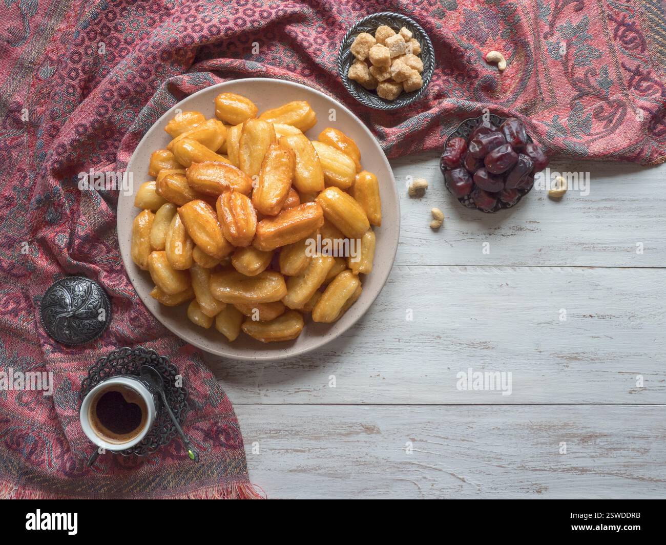 Arabic sweets celebration Eid Ramadan. Tulumba- arabian syrup-soaked ...
