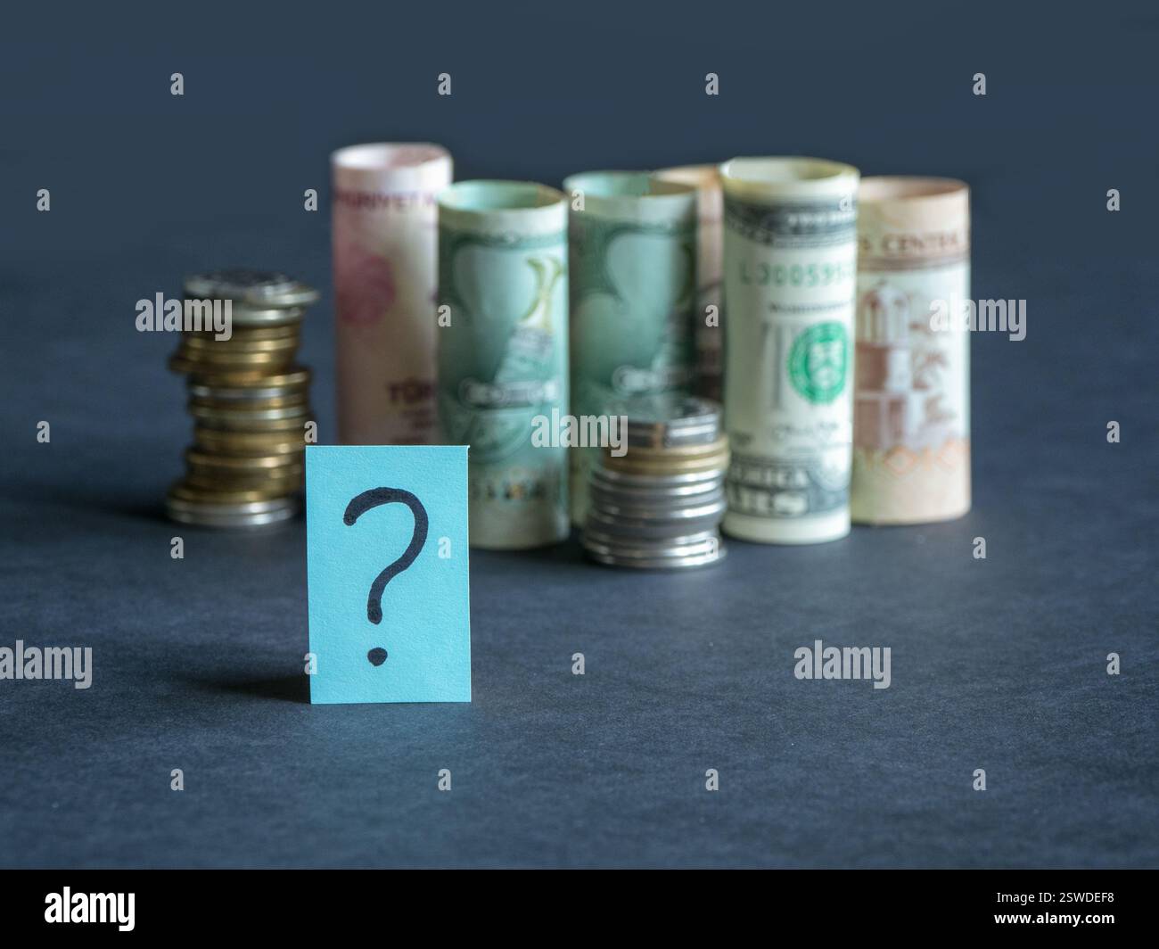 Question mark and money. Pandemic and the economic crisis of the ...