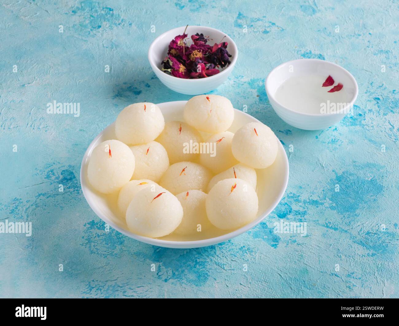 Sponge Rasgulla sweets, famous indian sweet food Stock Photo - Alamy
