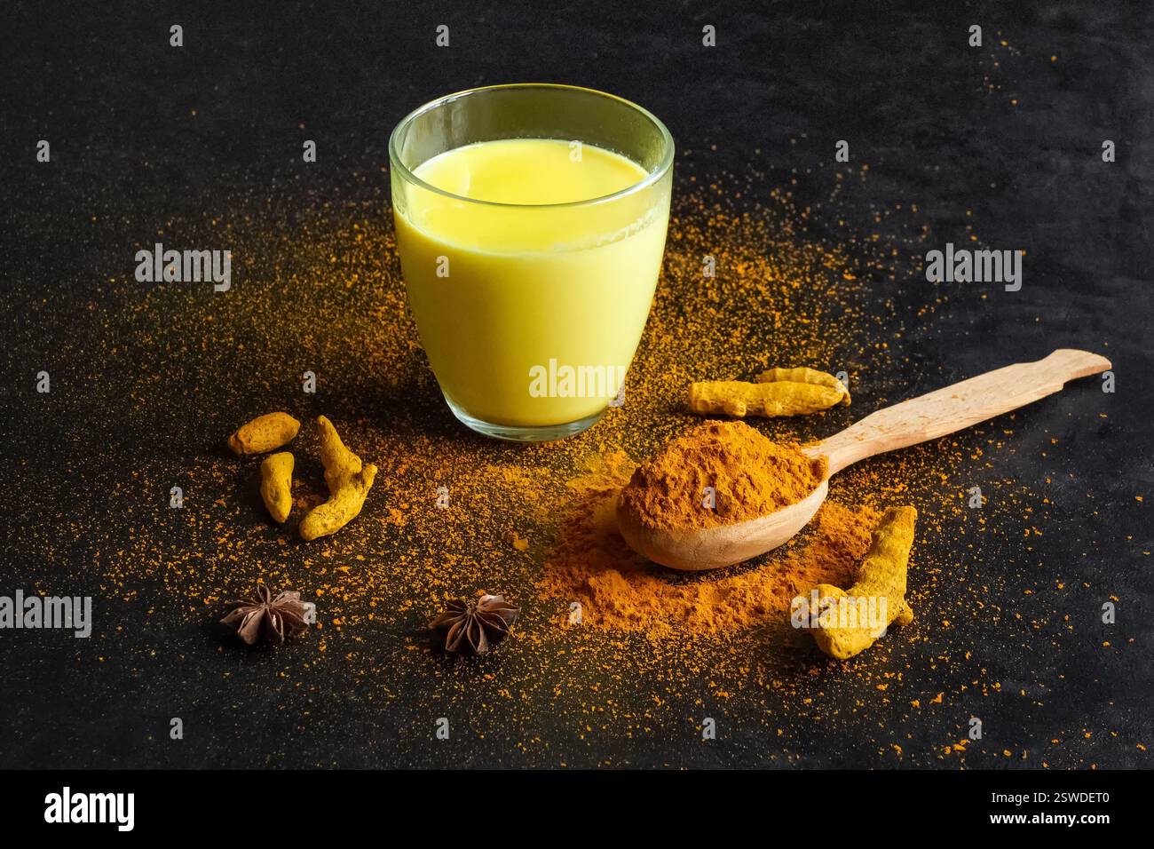 Traditional indian drink turmeric golden milk Stock Photo - Alamy