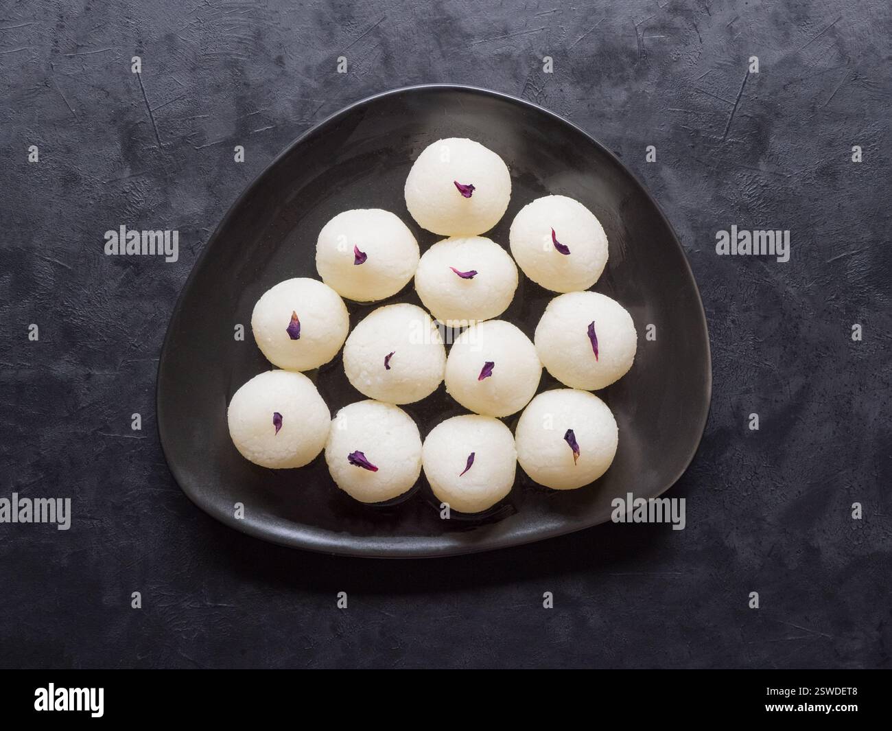 Sponge Rasgulla sweets, famous indian sweet food. Top view Stock Photo ...