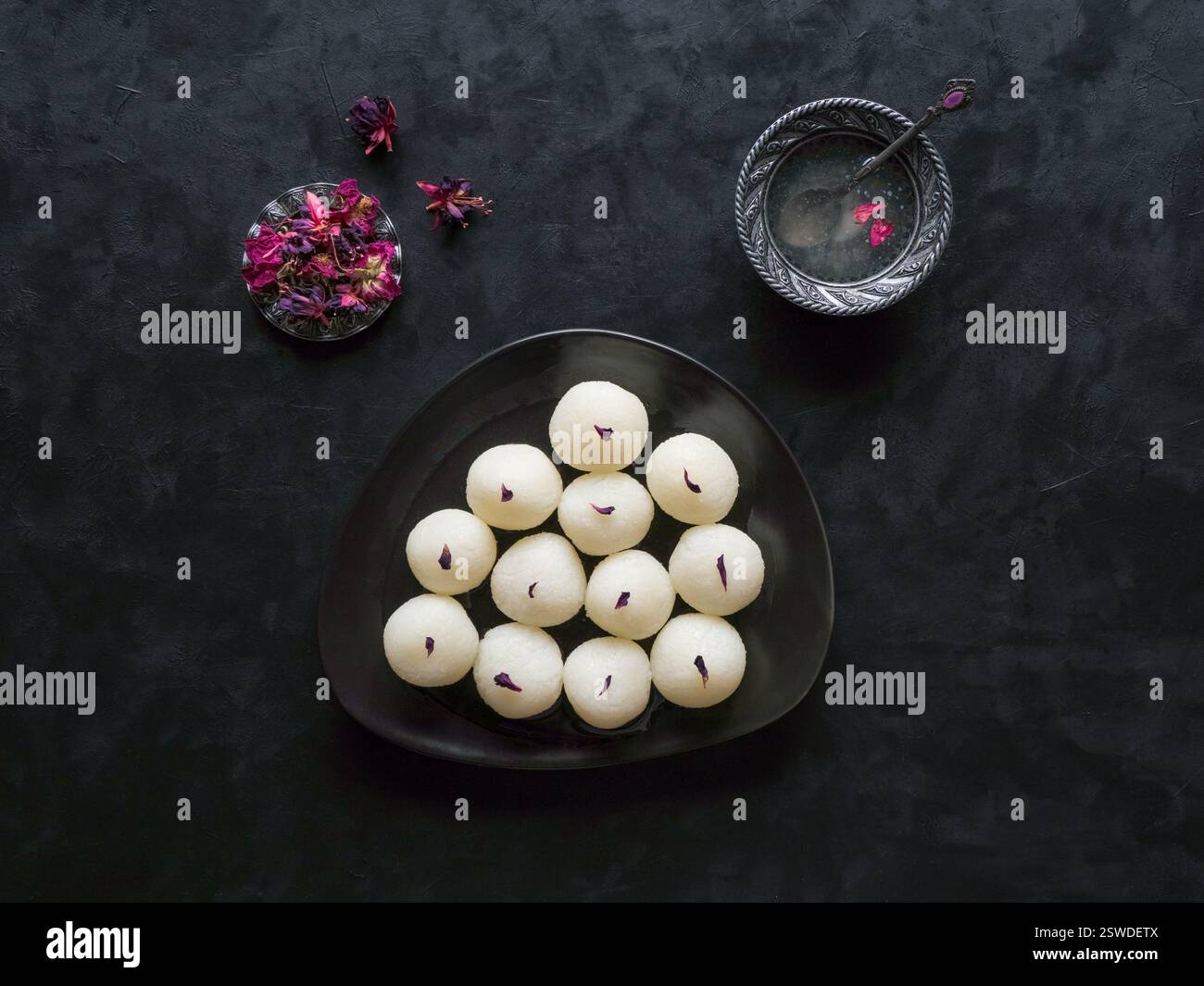 Indian Rasgulla dessert. Sweet served in a bowl, top view Stock Photo ...