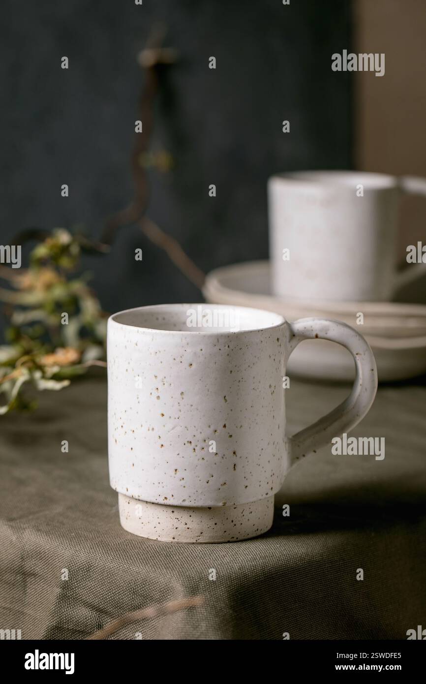 Set of empty craft ceramic coffee cups Stock Photo - Alamy