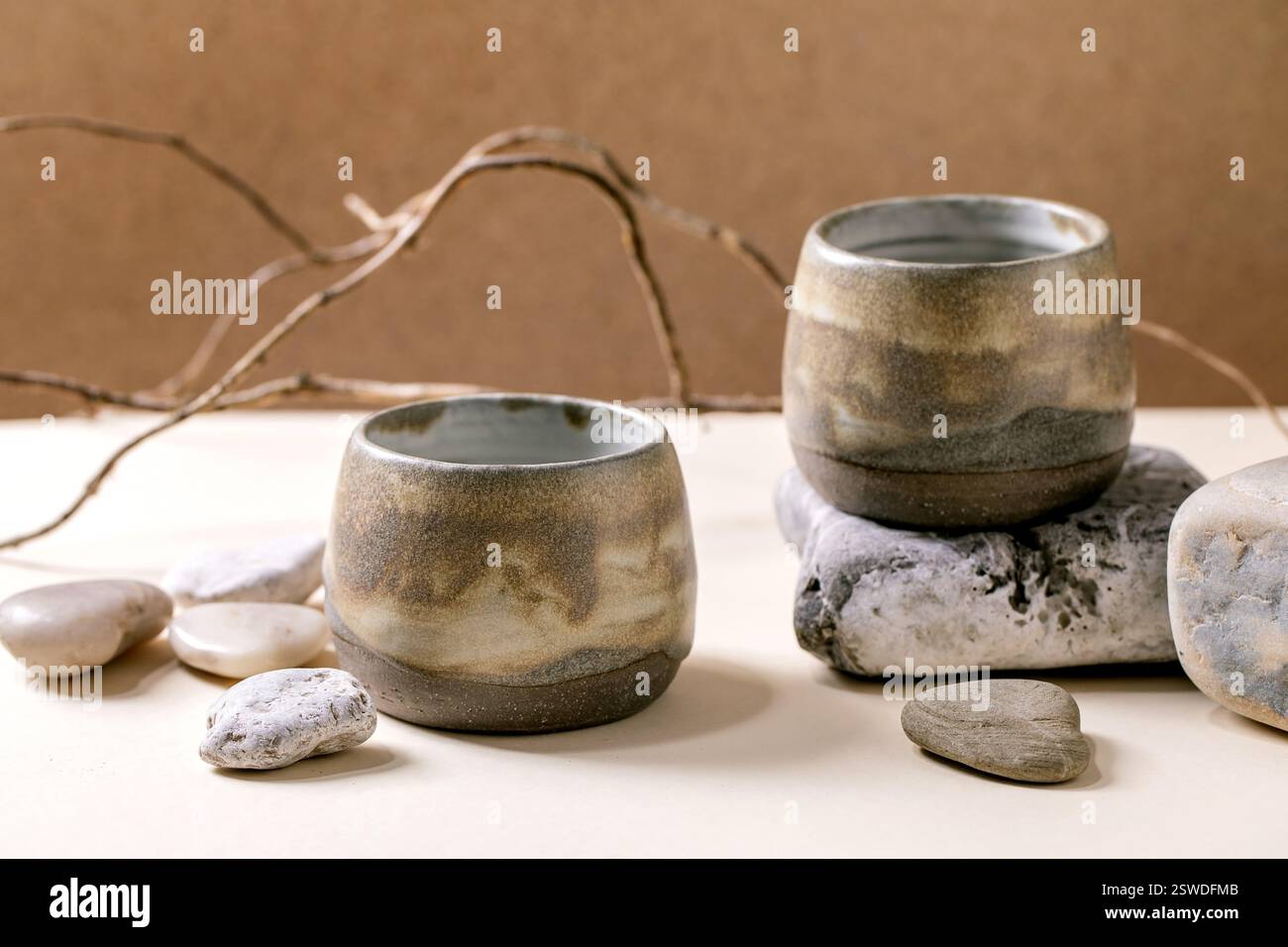 Set of empty grey ceramic cups Stock Photo - Alamy