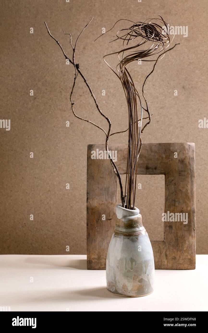 Dry twigs bouquet in ceramic vase Stock Photo - Alamy