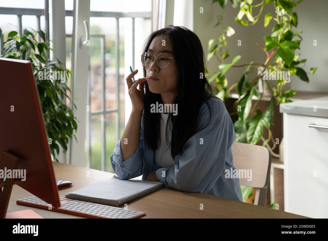Asian woman employee attending hi-res stock photography and images - Alamy