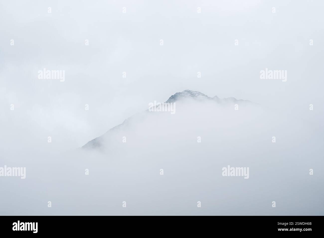 Soft focus. Minimalist mountain landscape. Wonderful minimalist landscape with big snowy ...