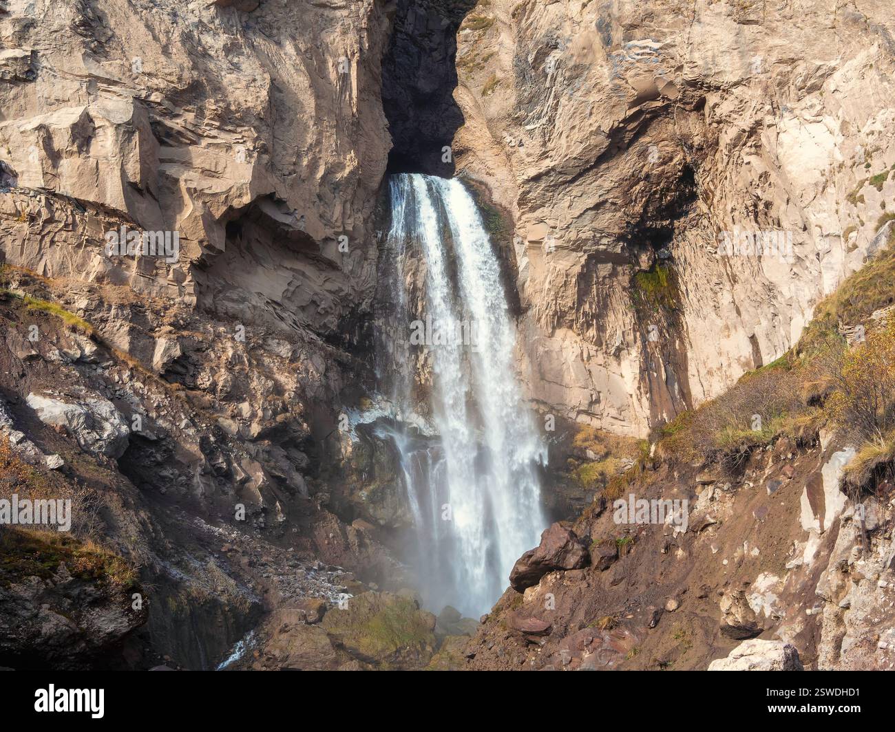 Scenic autumn landscape with vertical big Sultan waterfall at mountain ...