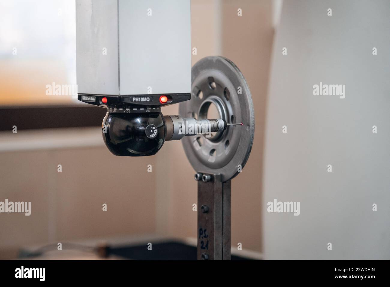 Precision measurement of a metal part using a coordinate measuring ...