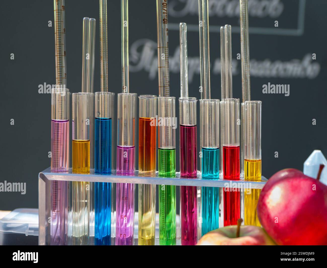 Test tubes with a colored reagents. Close up Stock Photo - Alamy