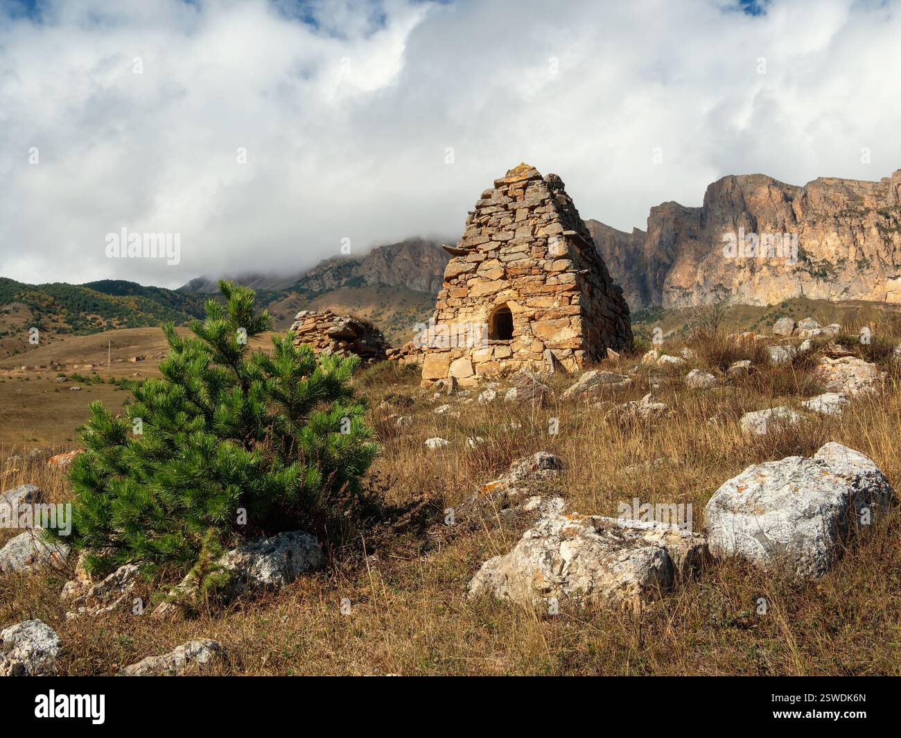 Old stone tomb, a crypt on the top of a mountain. Old Ossetian family ...