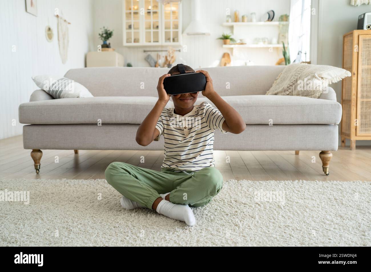 African boy using vr glasses hi-res stock photography and images - Alamy