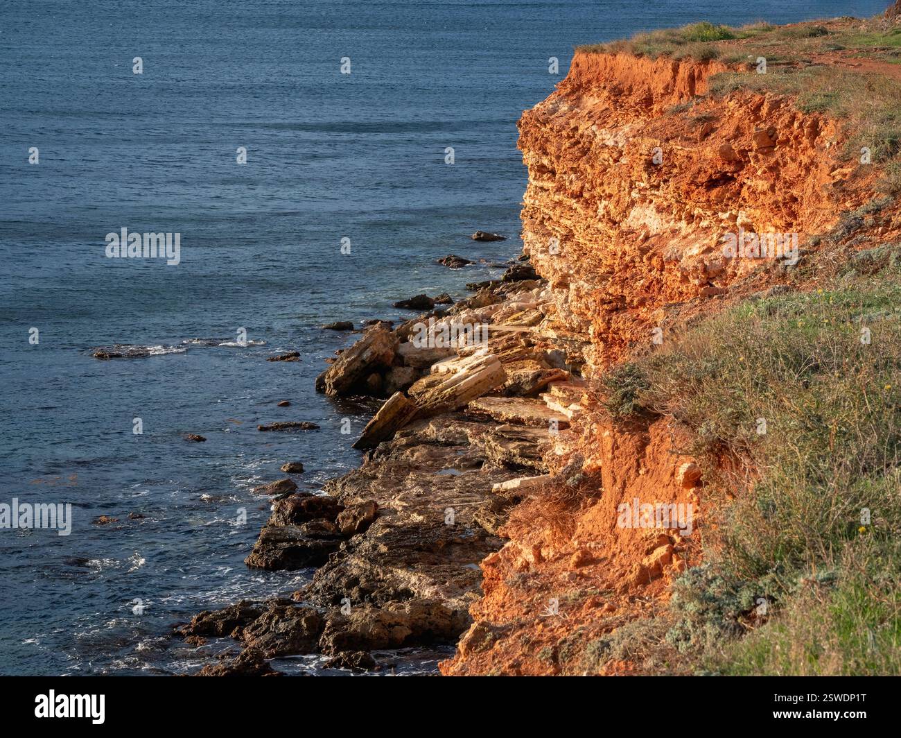 The Black Sea, the steep coast, the crumbling rock Stock Photo - Alamy